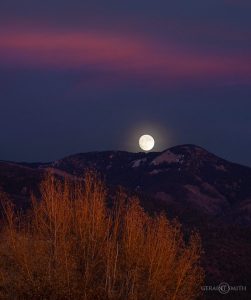 Moonrise, over the Sangre De Cristo Mountains, of New Mexico.